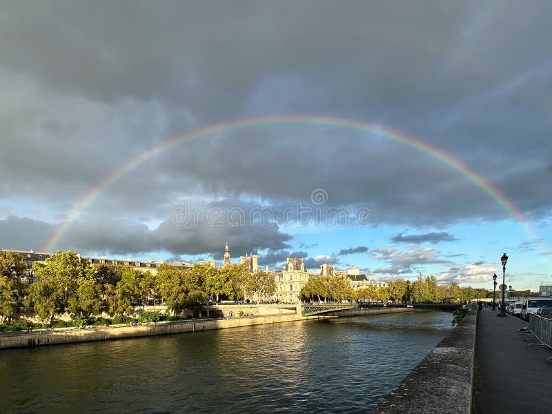 Rainbow Over the Seine in Paris, France Stock Photo - Image of rain ...