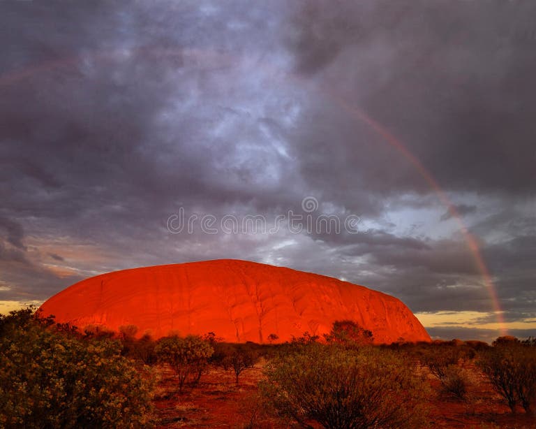 Rainbow over Uluru editorial stock image. Image of ayers - 10562019