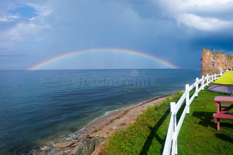 Rainbow over water stock image. Image of water, gaspesia - 80400645