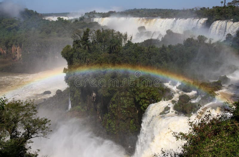 Rainbow over waterfall stock image. Image of misty, national - 99563449
