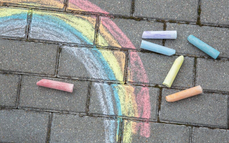Rainbow Painted in Colored Chalk on a Path on the Street Stock Image ...