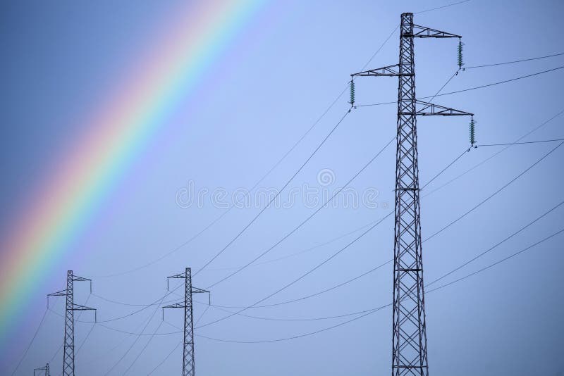 Rainbow through power line stock photo. Image of light - 71632174