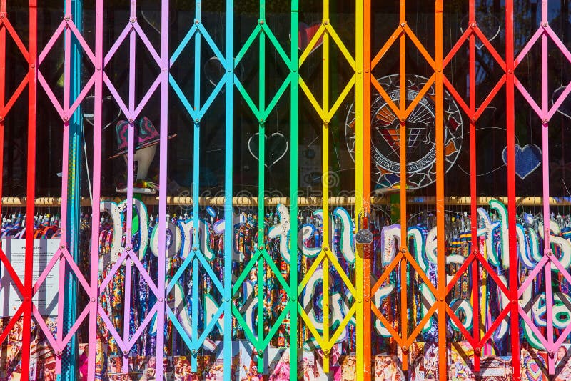 Rainbow Pride Colored Vibrant Metal Beams of Gate with Padlock Stock ...