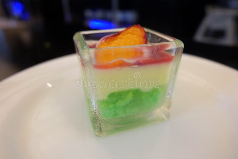 Rainbow Pudding with Strawberry Topping Stock Photo - Image of event ...