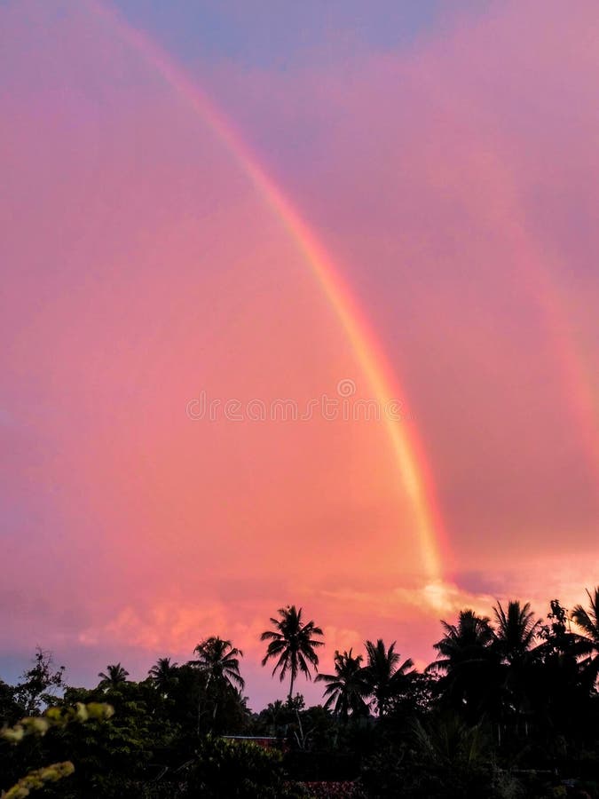 Rainbow after the Rain with the Reflection of the Sun Stock Image ...