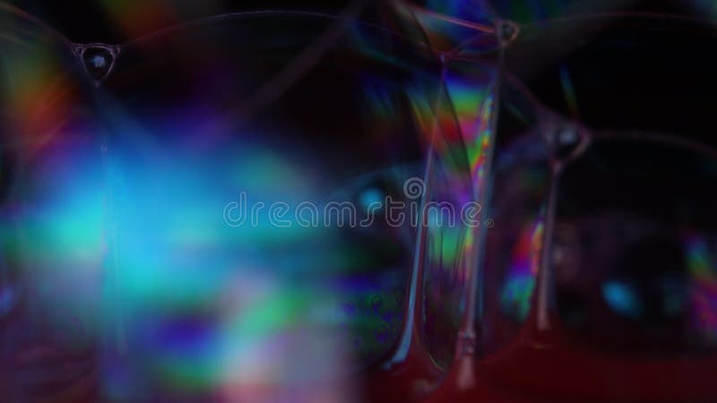 Rainbow Reflection of the Liquid on Black Background Stock Footage ...