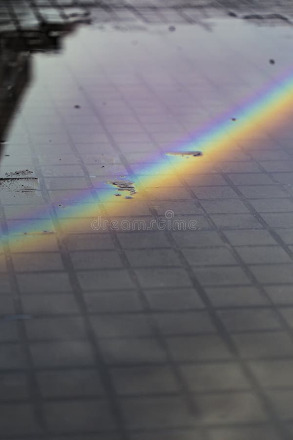 Rainbow Reflection on a Urban Floor Stock Photo - Image of rainbow ...