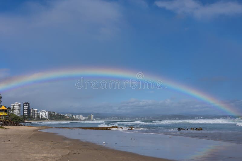 A Rainbow Over a Beach in a Calm Period before an Approaching Cyclone ...