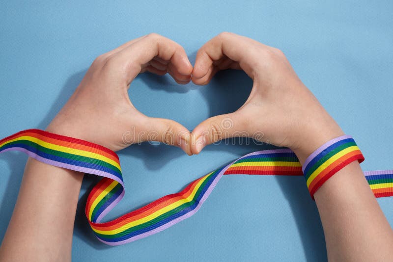 Rainbow Ribbon with Hands in Flat Style. Stock Photo - Image of ...