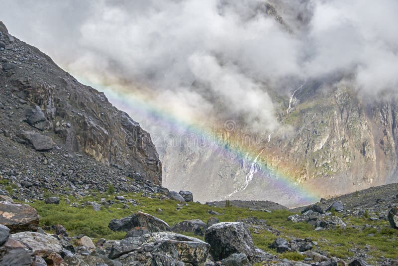 Rainbow between the Rocks. Mountain Landscape with a Beautiful Rainbow ...