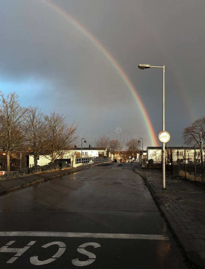 Rainbow in a rural area editorial photo. Image of sunset - 111729271