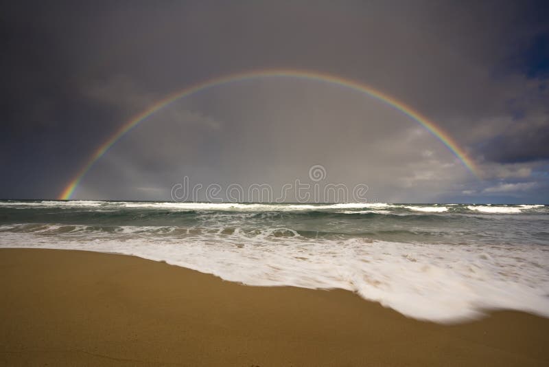 Rainbow at sea stock image. Image of light, storm, dramatic - 7530133