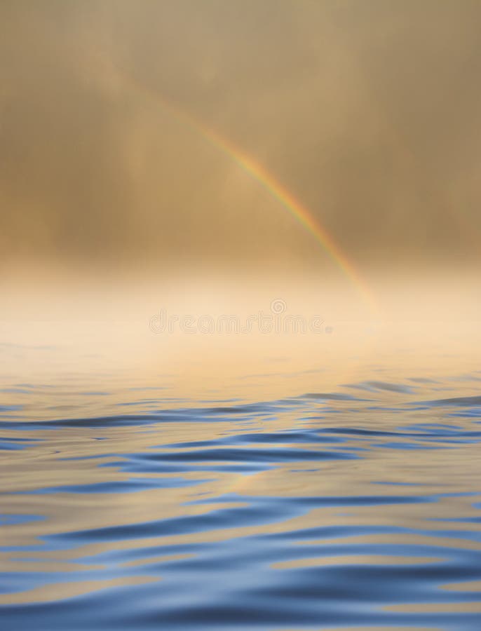 Rainbow in the Sky with Reflection on Water Stock Image - Image of ...