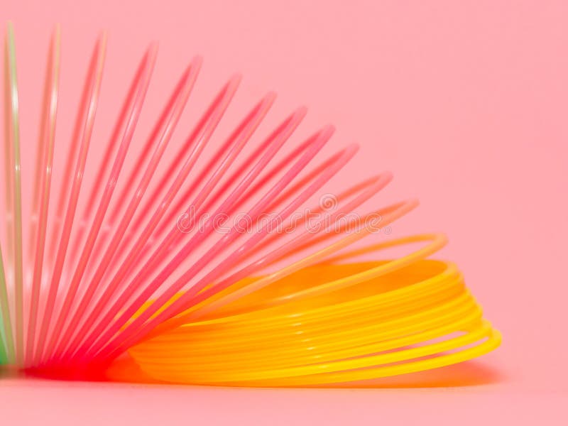 Rainbow Spring on a Pink Background Editorial Photography - Image of ...