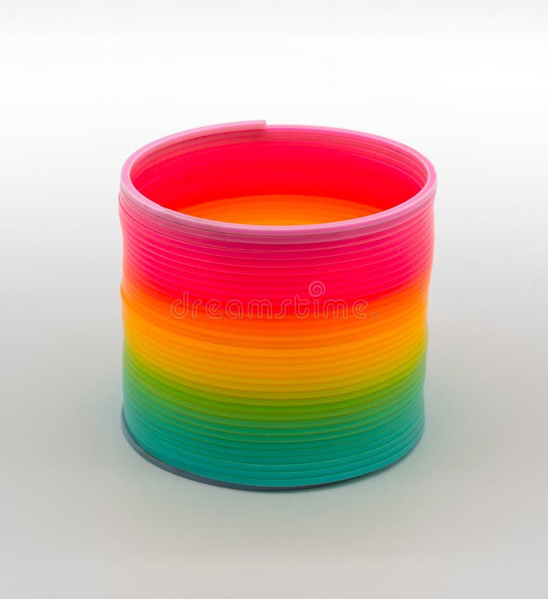 Rainbow plastic spring toy editorial image. Image of full - 10641490