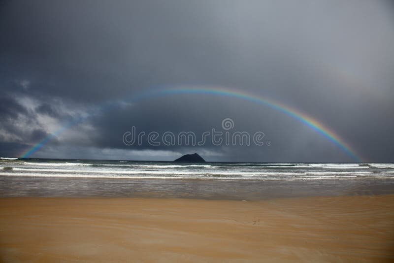 Rainbow in a storm sky stock photo. Image of overcast - 10485482