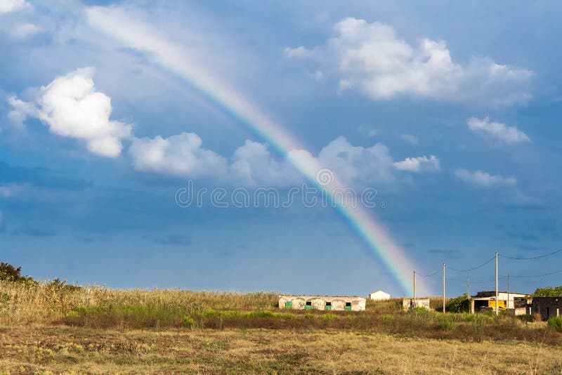 Rainbow in sunshine stock image. Image of sunny, clouds - 56077367