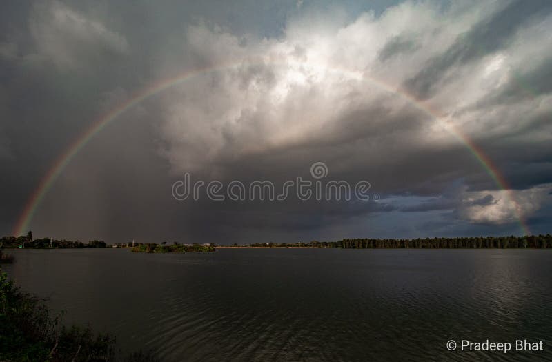 Rainbow time at sunset stock image. Image of dawn, wind - 195759903