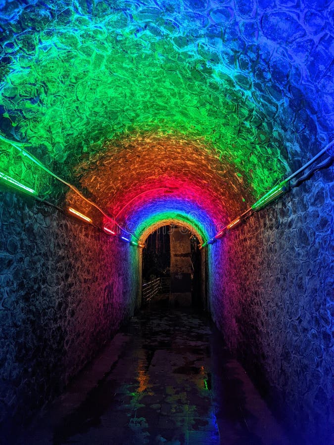 Rainbow tunnel at night stock image. Image of rainbow - 264479413