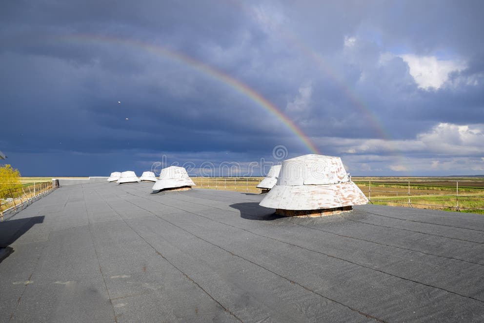 Rainbow, View from the Roof of the Building. Ventilation Outlets Stock ...