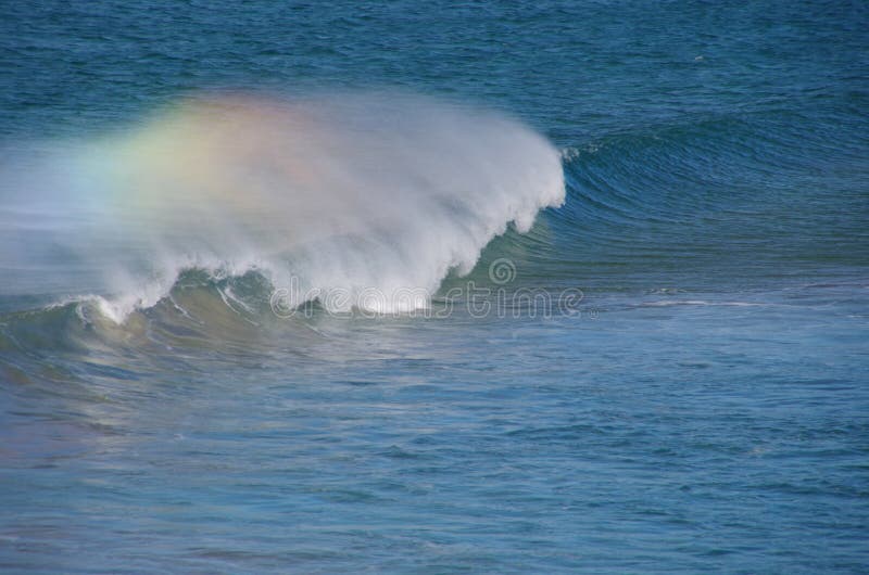 A rainbow wave stock photo. Image of surfing, wave, rainbow - 250086838