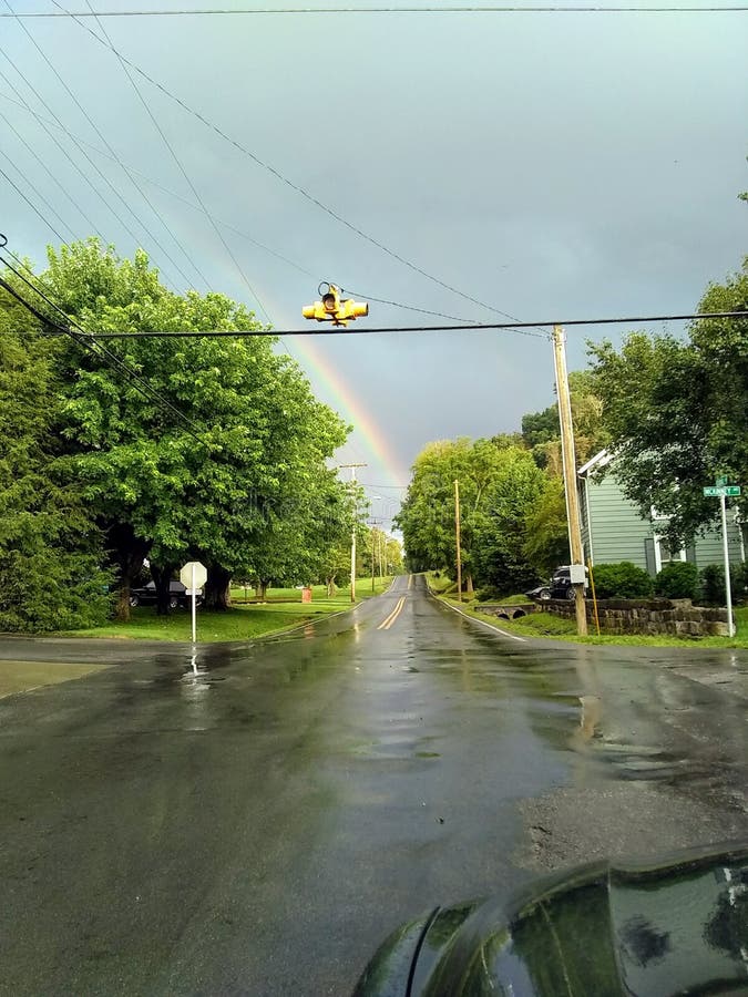 Rainbow at 4-way stop sign stock photo. Image of 4way - 164973470
