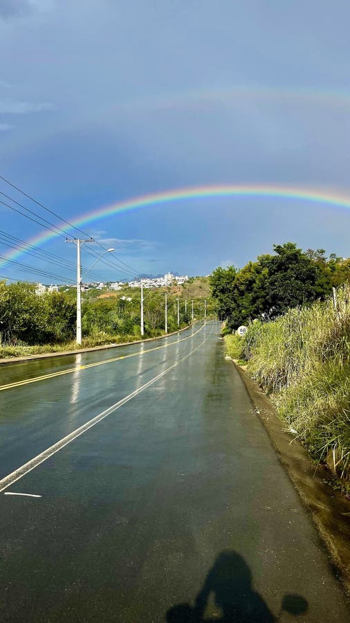 Rainbow on Wet Road after Rain. Stock Image - Image of lane, raybow ...