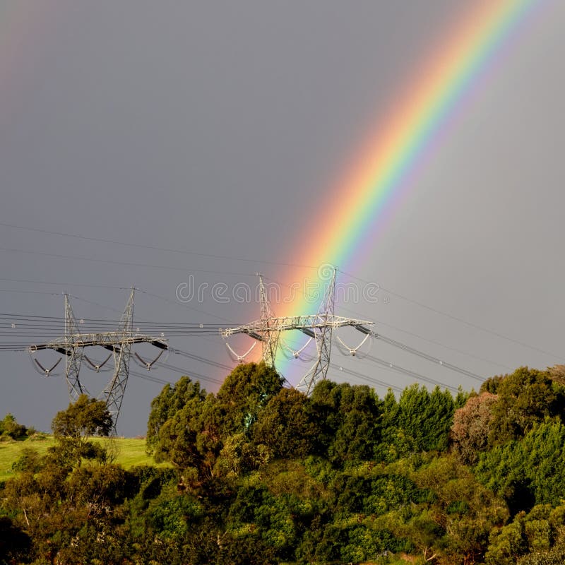 Rainbows and power lines stock image. Image of industry - 33005667