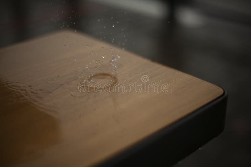 Raindrops Break on the Surface of the Bench. Rain Outside in Detail ...