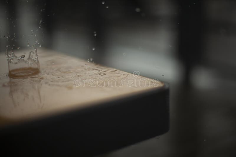 Raindrops Break on the Surface of the Bench. Rain Outside in Detail ...