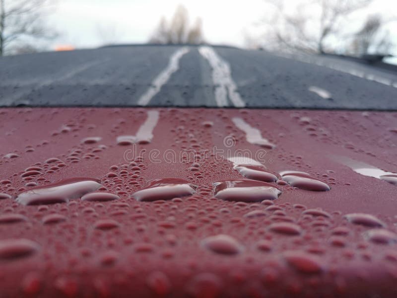 Raindrops on a car stock image. Image of clear, pattern - 242274253