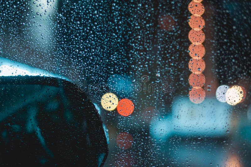 Raindrops on Car Windshield during Night Driving on a Rainy Evening ...