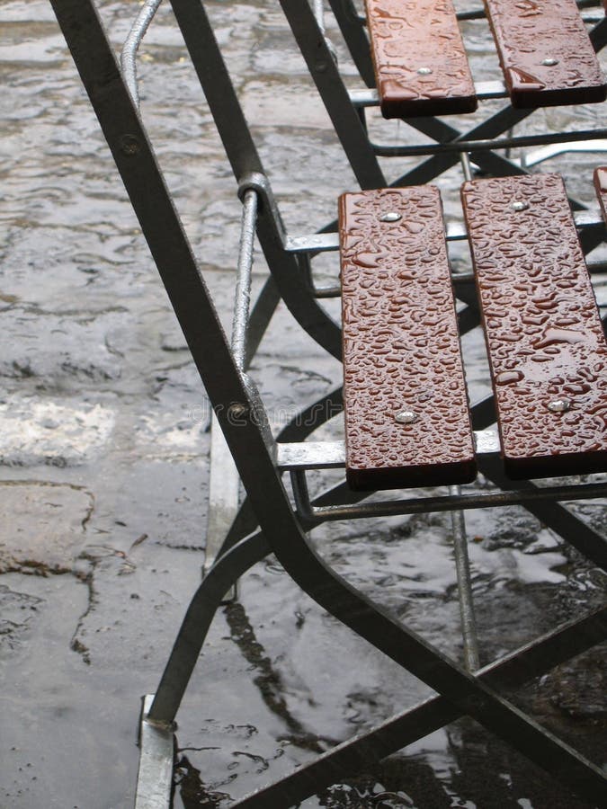 Raindrops on chairs stock photo. Image of rain, barstool - 183346