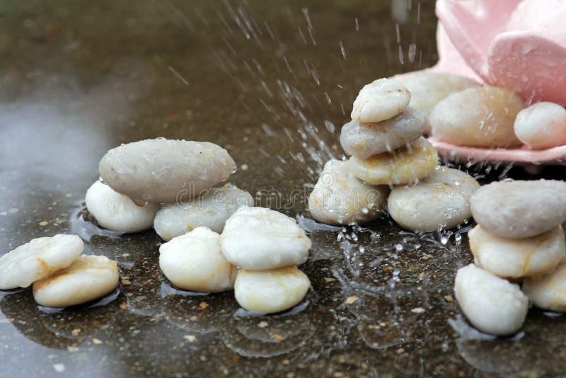 Raindrops on cold stones stock image. Image of rain, downpour - 66997959