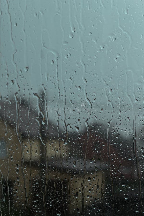 Raindrops Dripping on the Window Evening on a Window Stock Photo ...