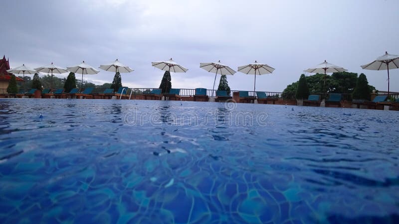 Raindrops Fall on the Water in the Pool. Stock Photo - Image of travel ...