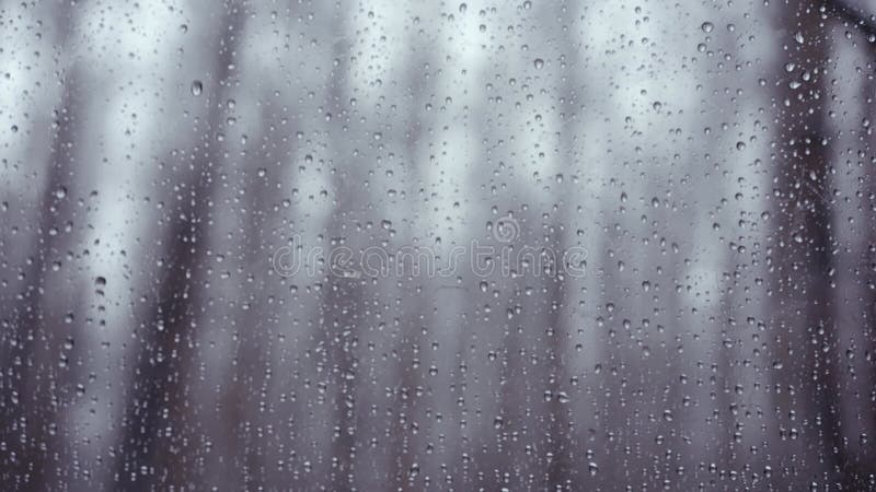 Raindrops Falling on Car Windows. Selective Focus Stock Video - Video ...