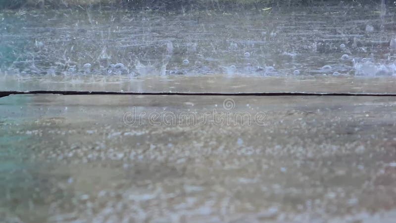 Raindrops Falling on Ground. Rain Splashes Hit Ground, Stock Video ...