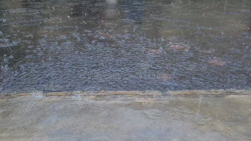 Raindrops Falling on Ground. Rain Splashes Hit Ground, Stock Video ...