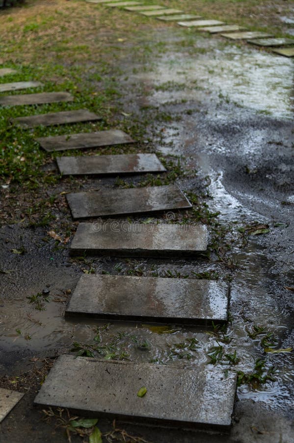 Raindrop Flooding on Glass and Footpath with the Rain Stock Photo ...