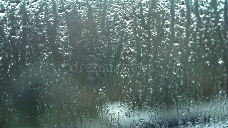 Raindrops Flow Down The Window Glass In Cloudy Weather Stock Footage