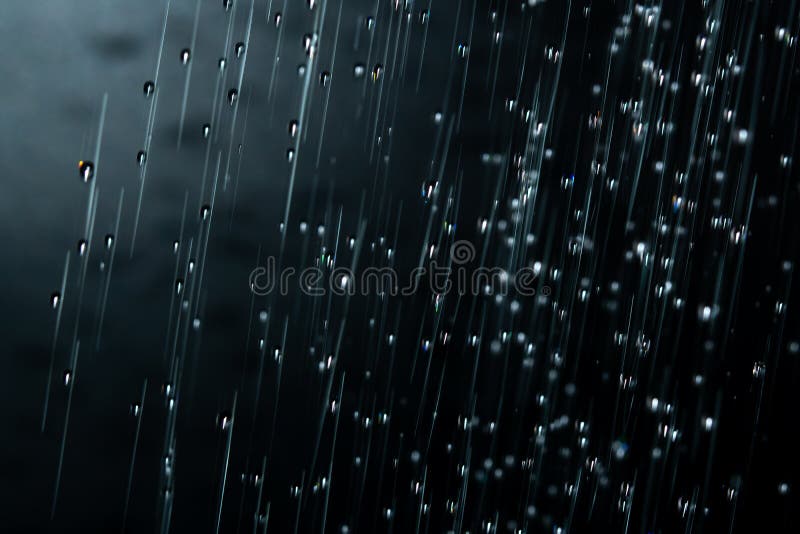 Raindrops while Flying in the Dark Stock Photo - Image of background ...
