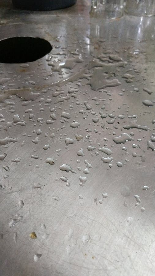 Raindrops form small balls stock photo. Image of water - 367069734