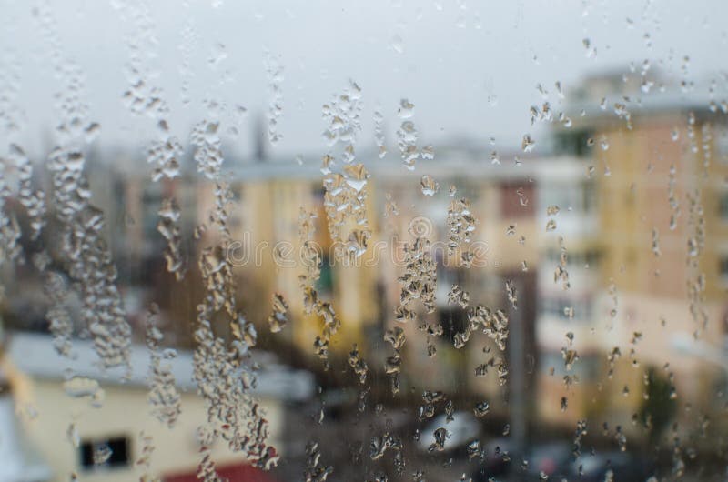 Raindrops on Glass Window with Building View Stock Photo - Image of ...