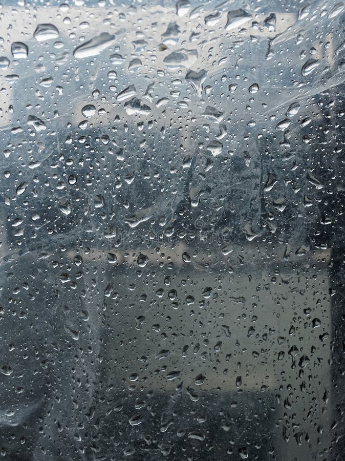 Raindrops on Plastick Sheet, View from the Window Stock Photo - Image ...