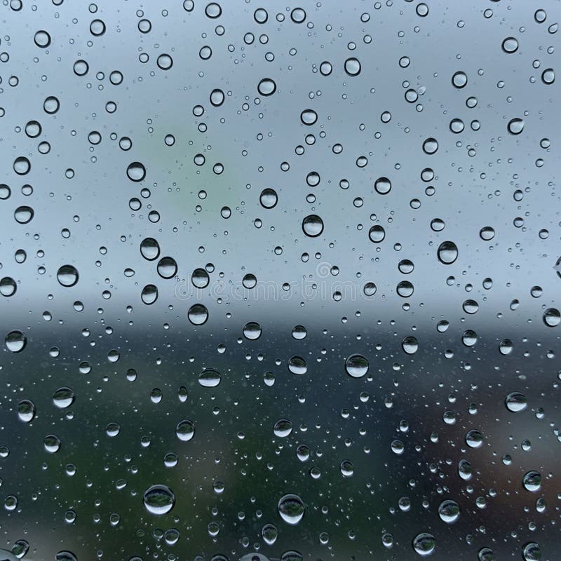 Raindrops Scattered Across a Glass Window, Creating a Natural Pattern ...
