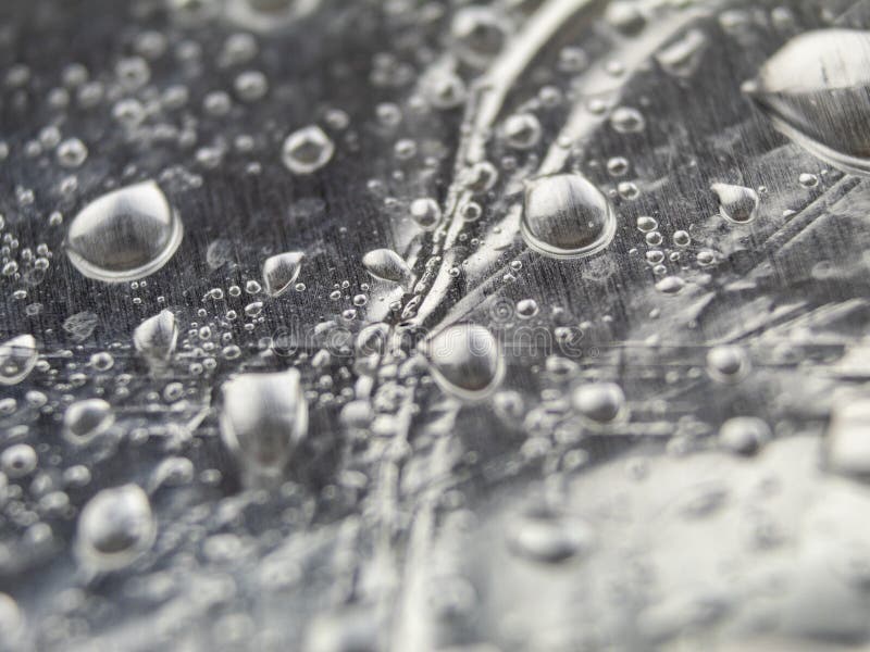 Raindrops on Silver Surface Stock Image - Image of water, bubbles: 45055039