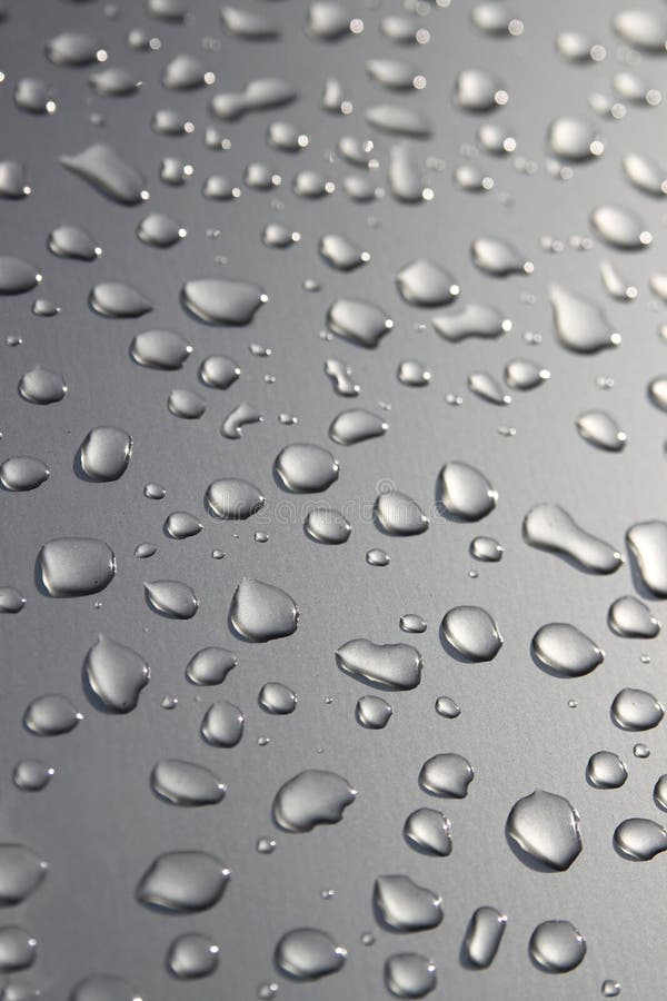 Raindrops on Silver Surface Stock Photo - Image of bright, drips: 45055164