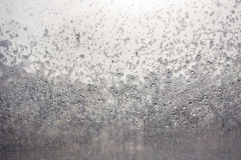 Raindrops on the Surface of Window Panes on a Cloudy Day Stock Photo ...