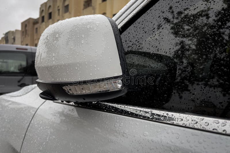 Raindrops on White Car Side Rear-view Mirror Stock Image - Image of ...